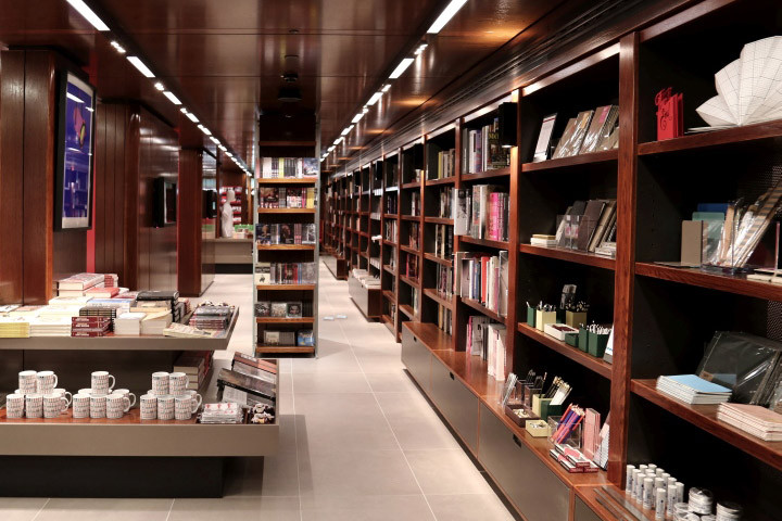 » National Theatre Bookshop lighting by Optelma Lighting, London – UK